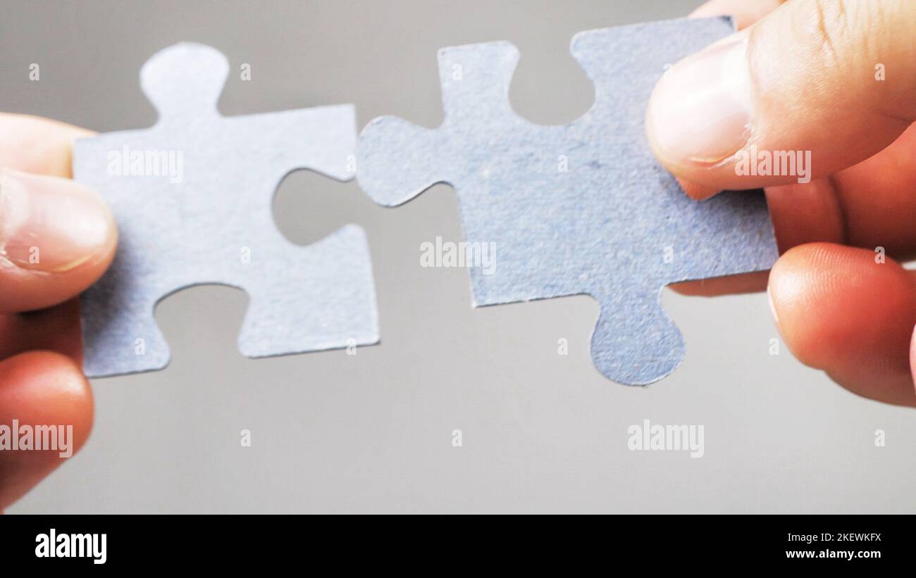 Two hands held together hi-res stock photography and images - Alamy