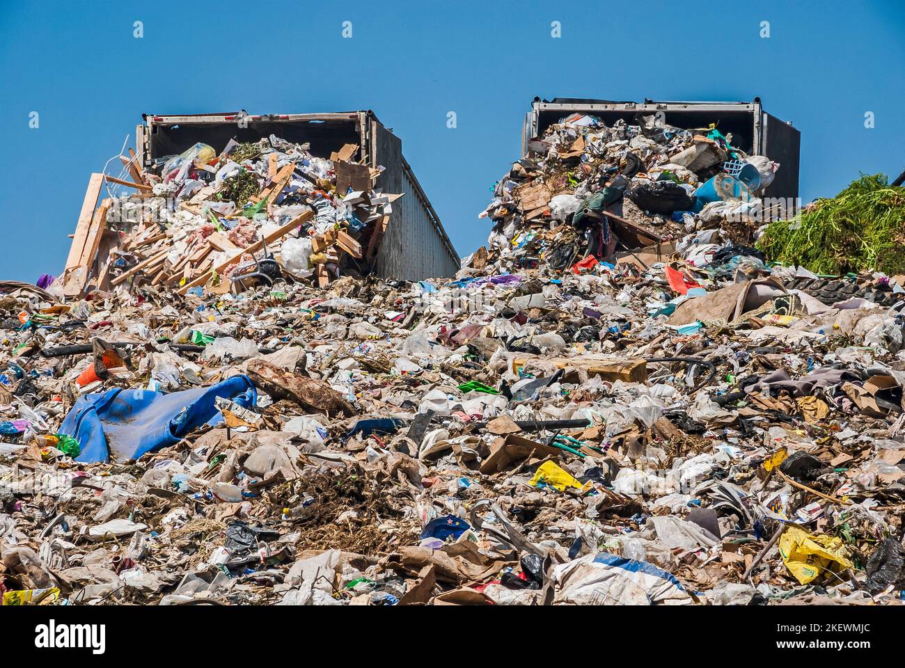 Two semi trailers filled with garbage at an active landfill Stock Photo ...
