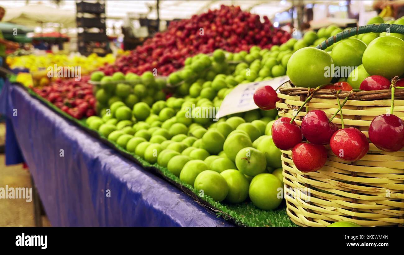 Fruit Cherry and Plum in a Public Bazaar Stock Photo - Alamy