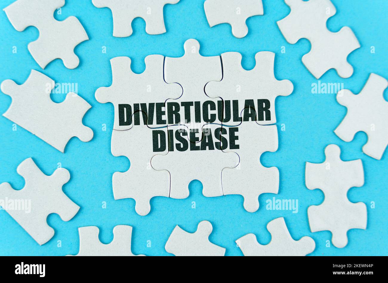 Medical concept. On a blue background are white puzzles with the ...