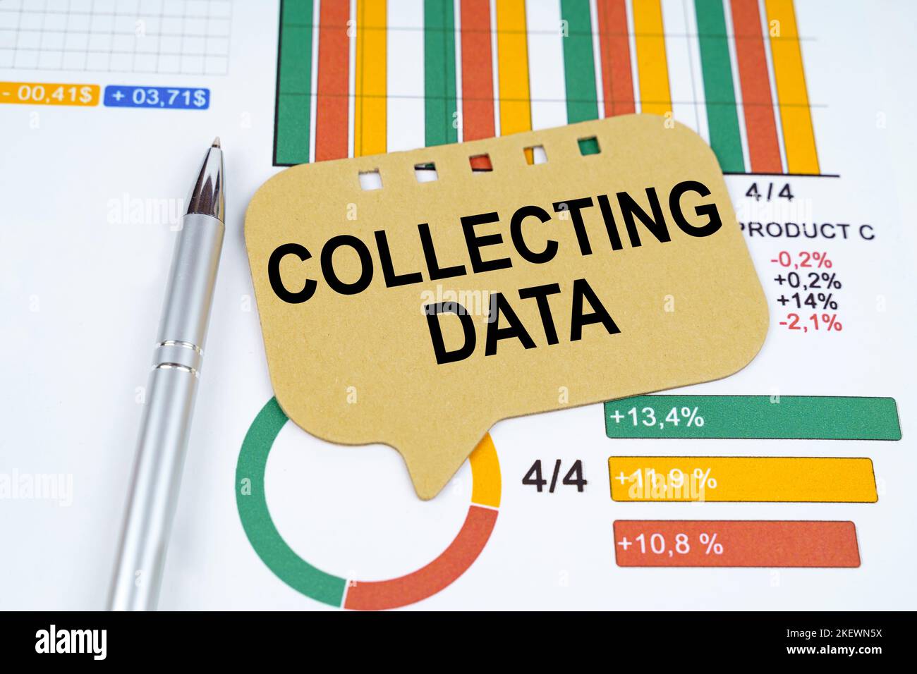 Business concept. On the business charts is a pen and a sign with the ...