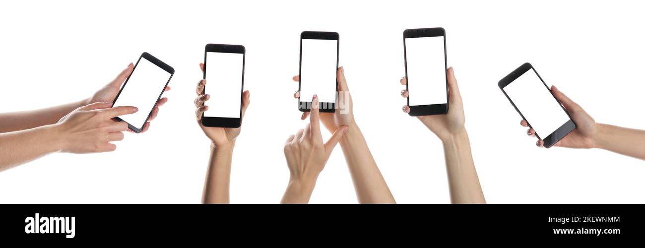 Set of hands holding mobile phones with blank screens on white ...