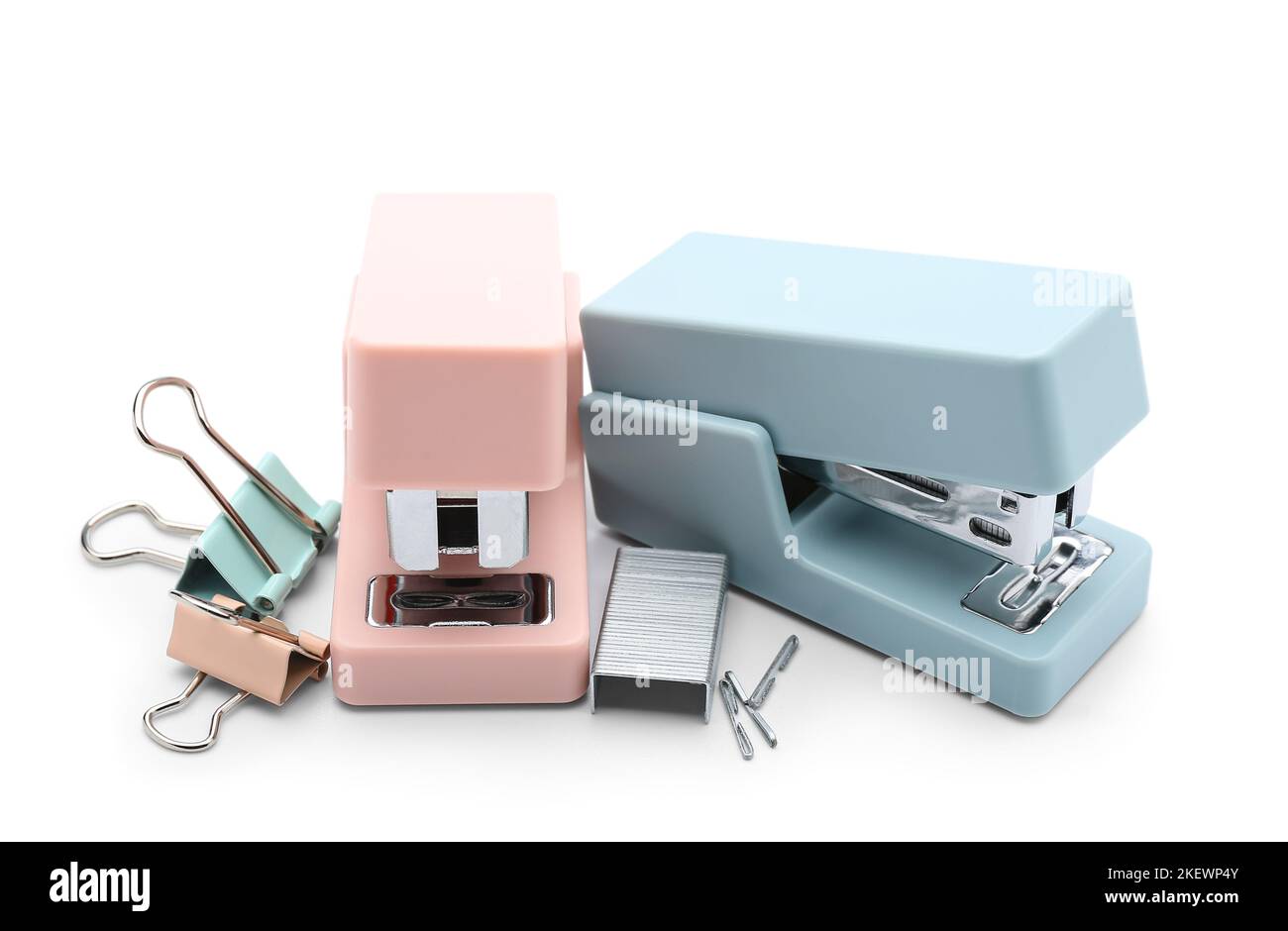 Office staplers, staples and paper clips on white background Stock ...