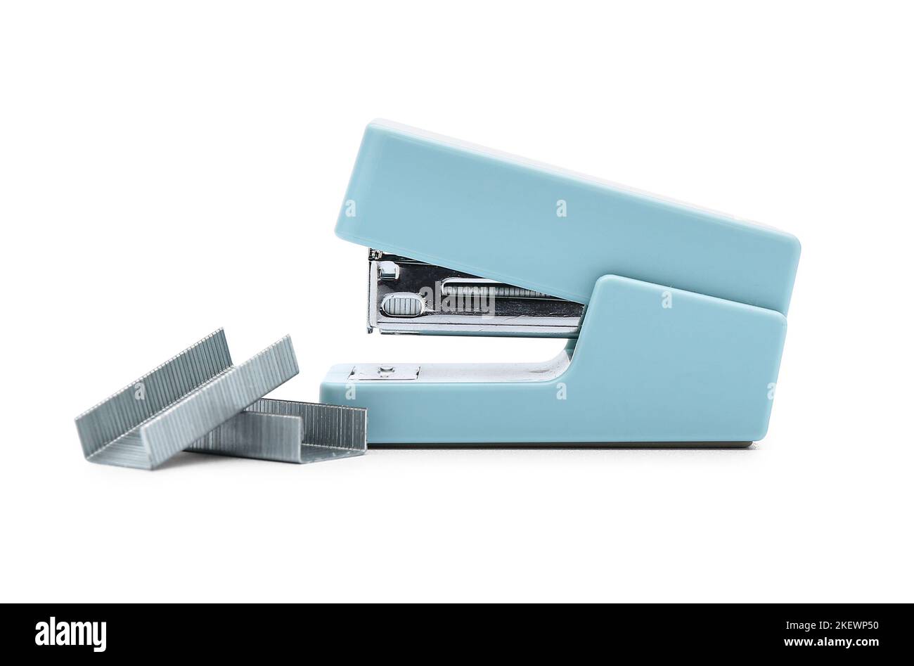 Blue stapler with staples on white background Stock Photo - Alamy