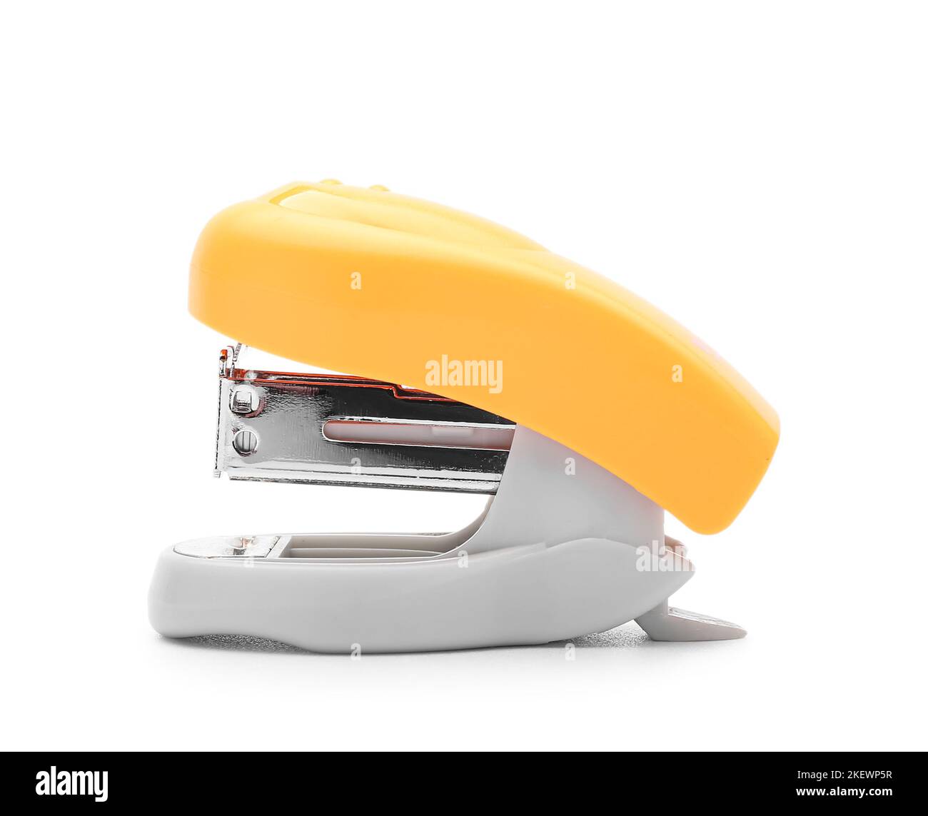 Orange stapler isolated on white background Stock Photo - Alamy