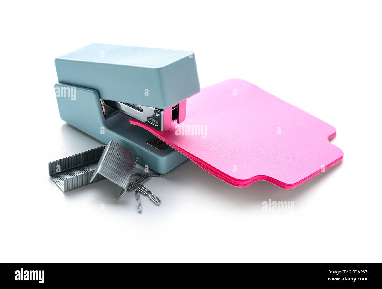 Stapler with sticky notes and staples on white background Stock Photo ...