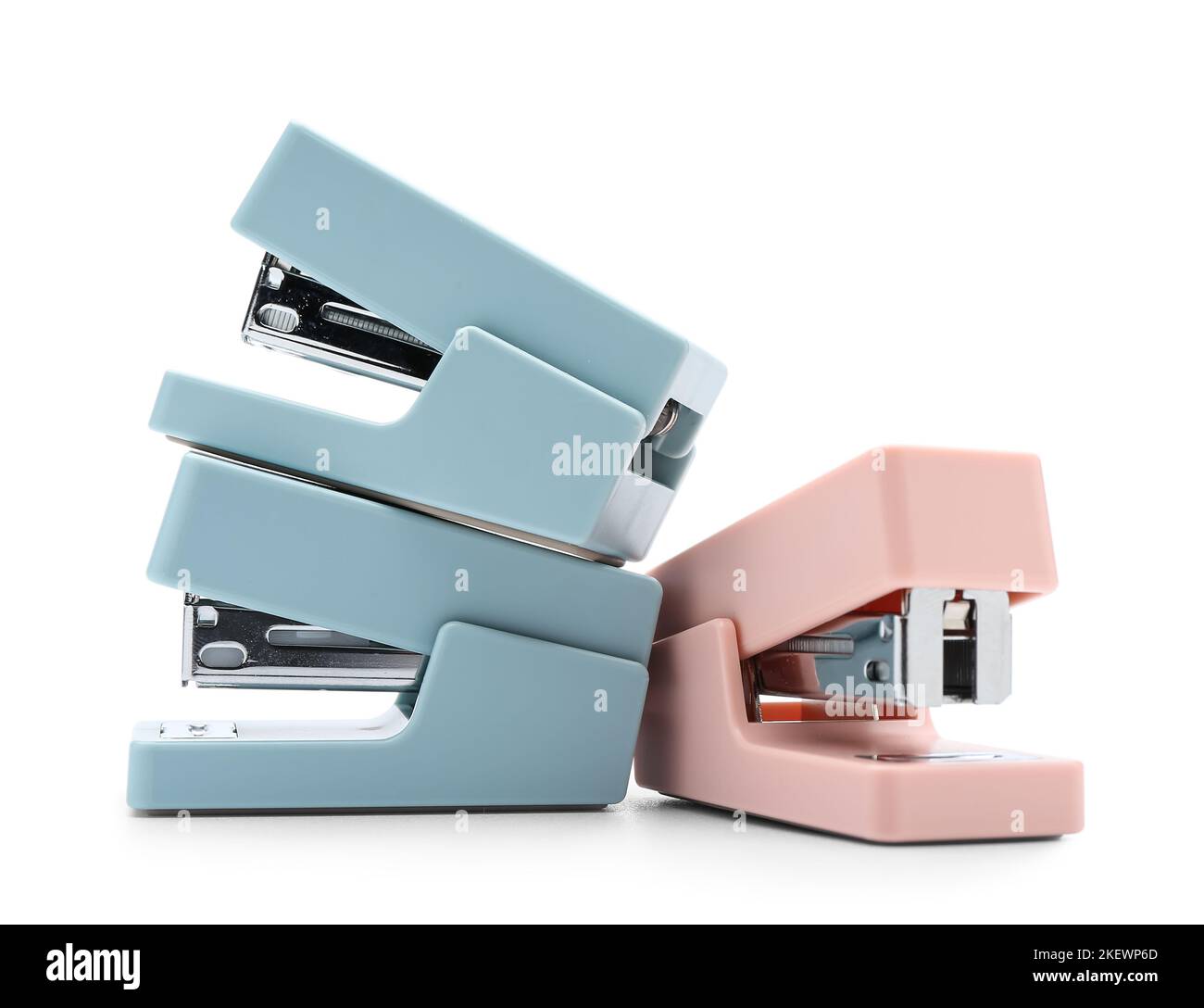 Colorful staplers isolated on white background Stock Photo - Alamy