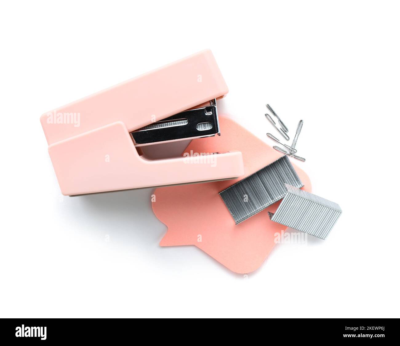 Stapler, sticky notes and staples on white background Stock Photo - Alamy