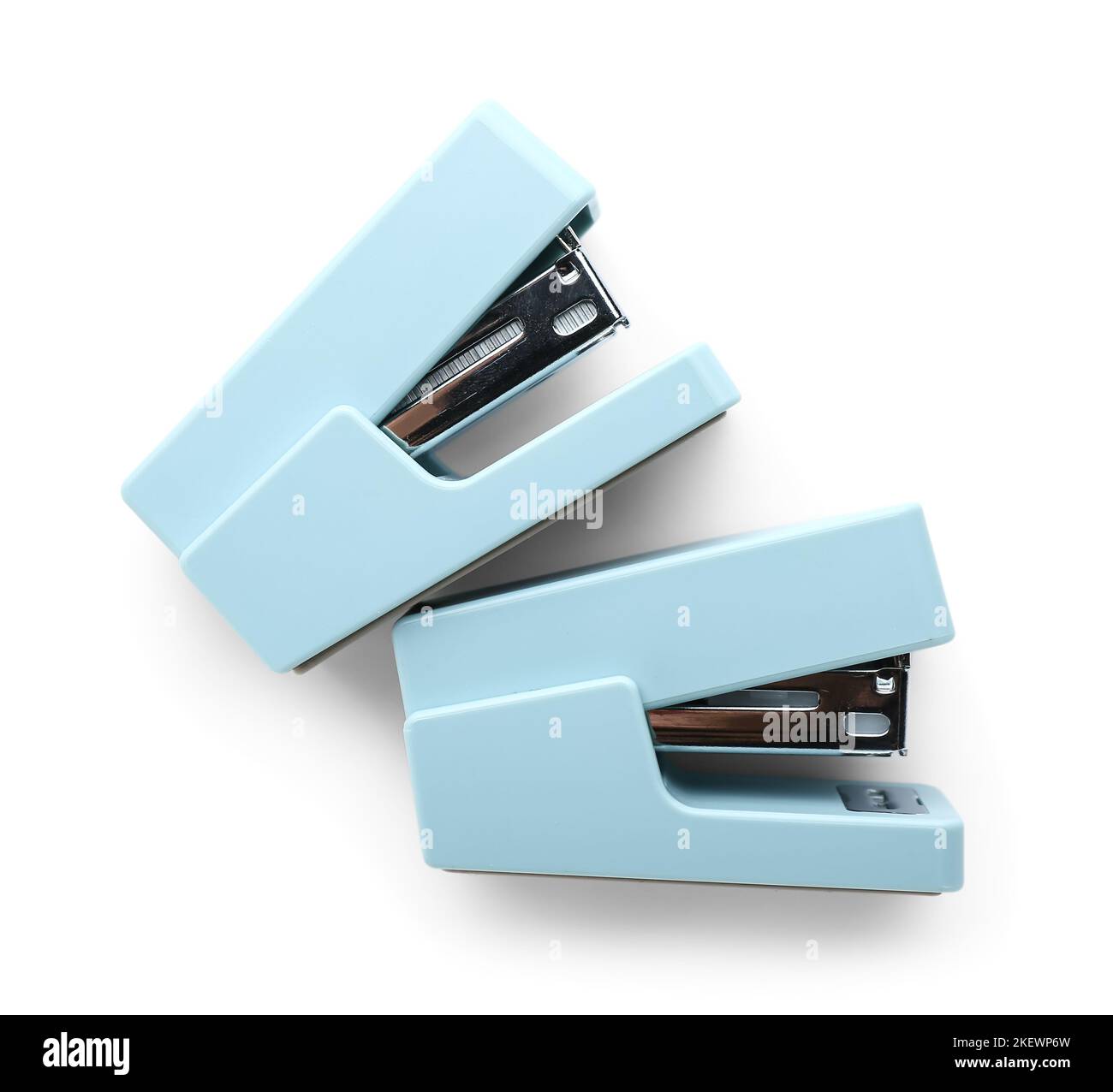 Two office staplers isolated on white background Stock Photo - Alamy