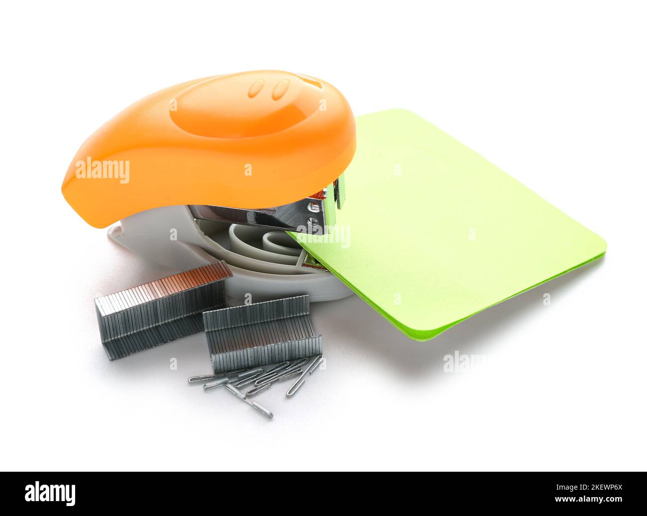 Office stapler with sticky notes and staples on white background Stock ...