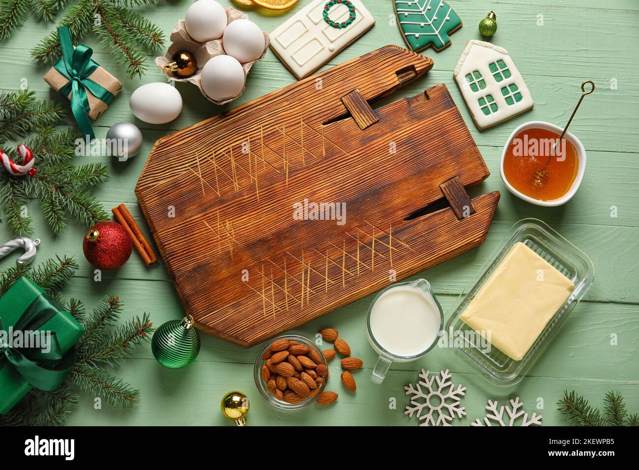 Composition with cutting board, Christmas cookies, ingredients and ...