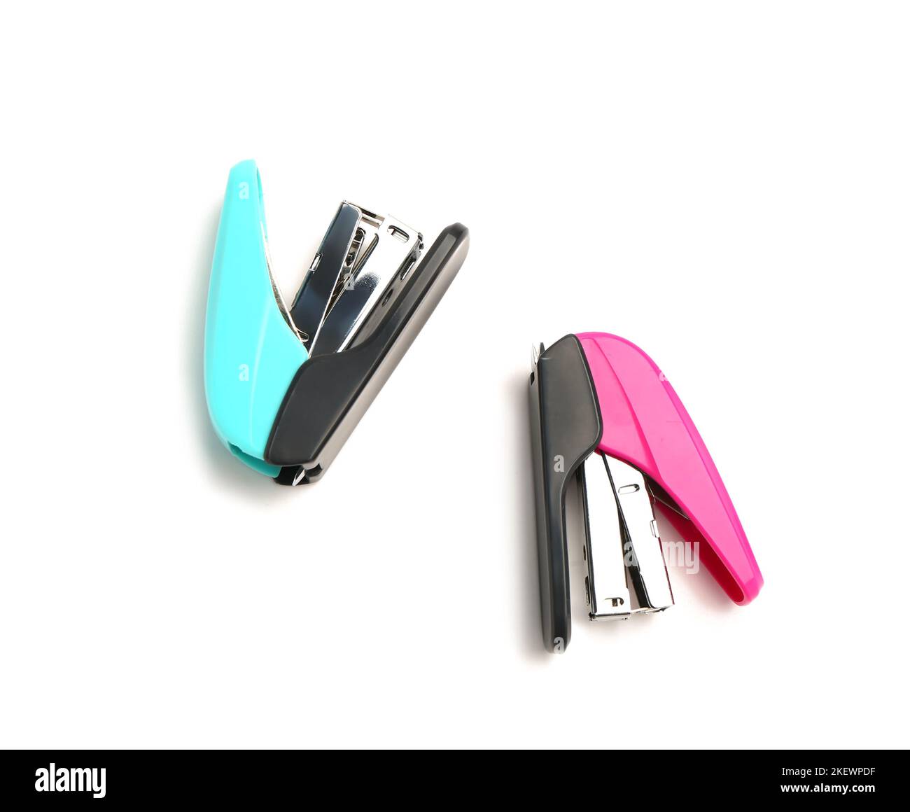 Office staplers isolated on white background Stock Photo - Alamy