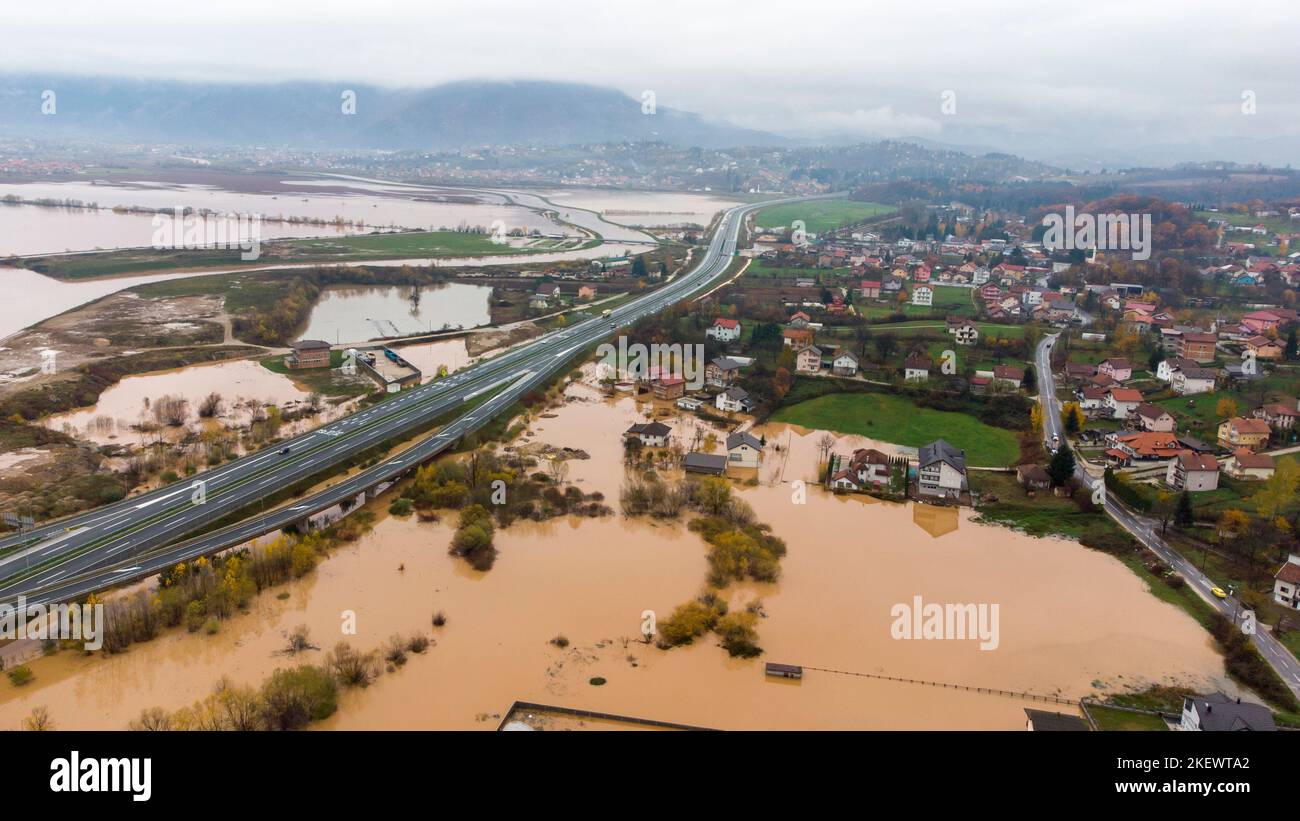 Aerial drone view of torrential rain causes flash floods in residential ...