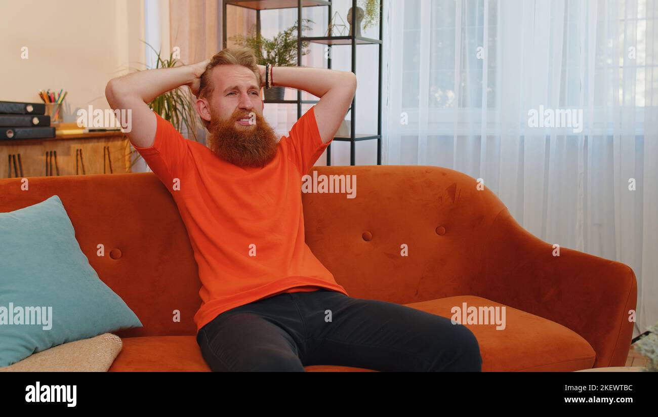 Scared caucasian bearded man screams from stress tension problems panic ...