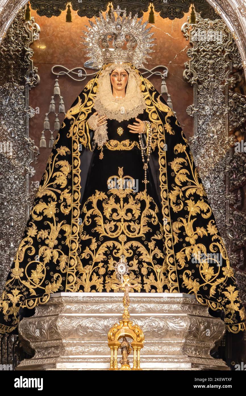 Virgin of Macarena in main altar of La Macarena church, in Seville ...