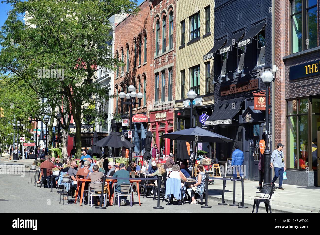 Ann Arbor, Michigan, USA. A street lined with shops, restaurants and ...