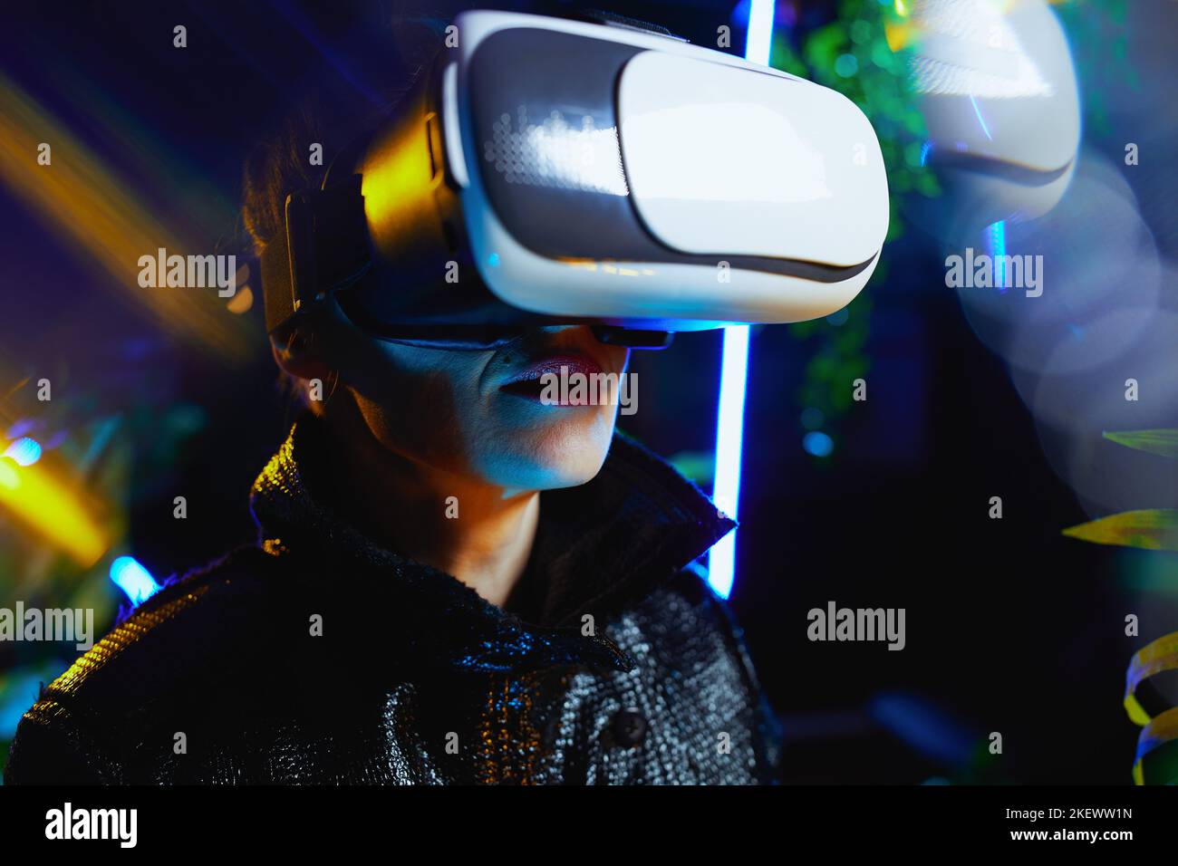 modern female in metaverse in vr goggles Stock Photo - Alamy