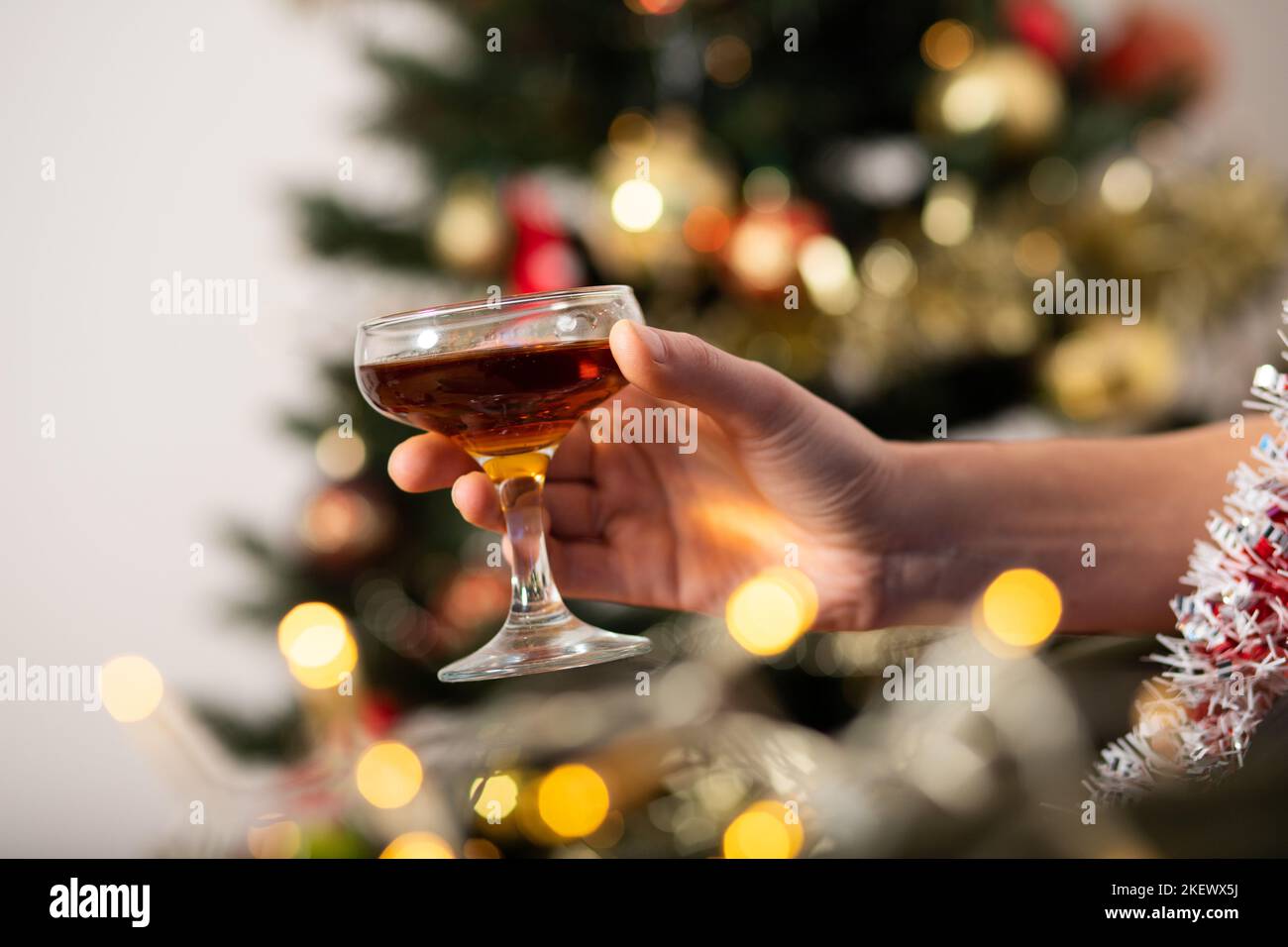 Hand woman holding red cocktail hi-res stock photography and images - Alamy