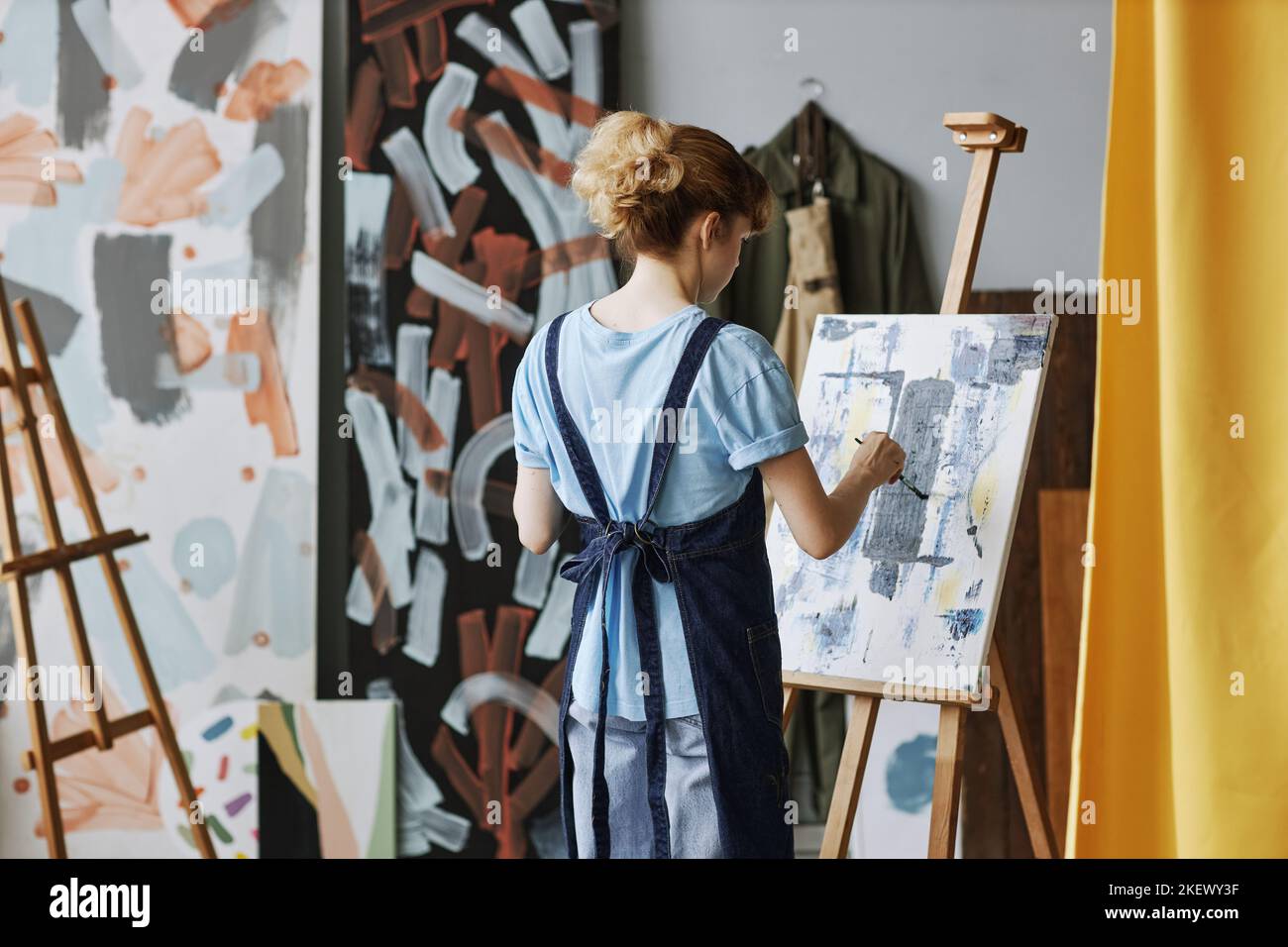 Female Artist Painting On Canvas Female Artist Painting On Canvas At