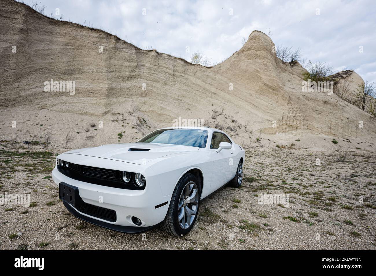 White powerfull american muscle car in career Stock Photo - Alamy