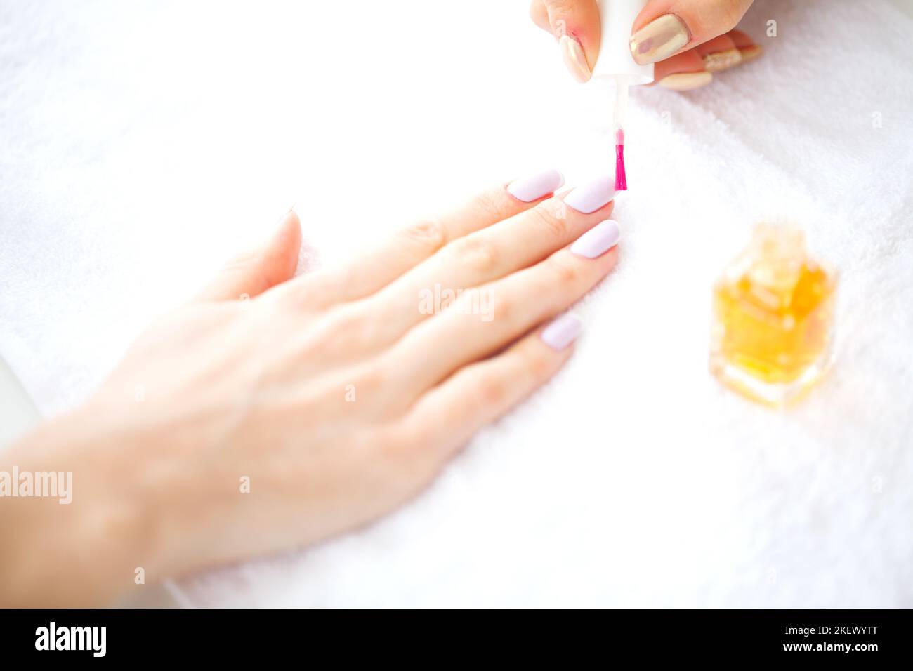 SPA manicure. French manicure at spa salon. Woman hands in a nail salon ...