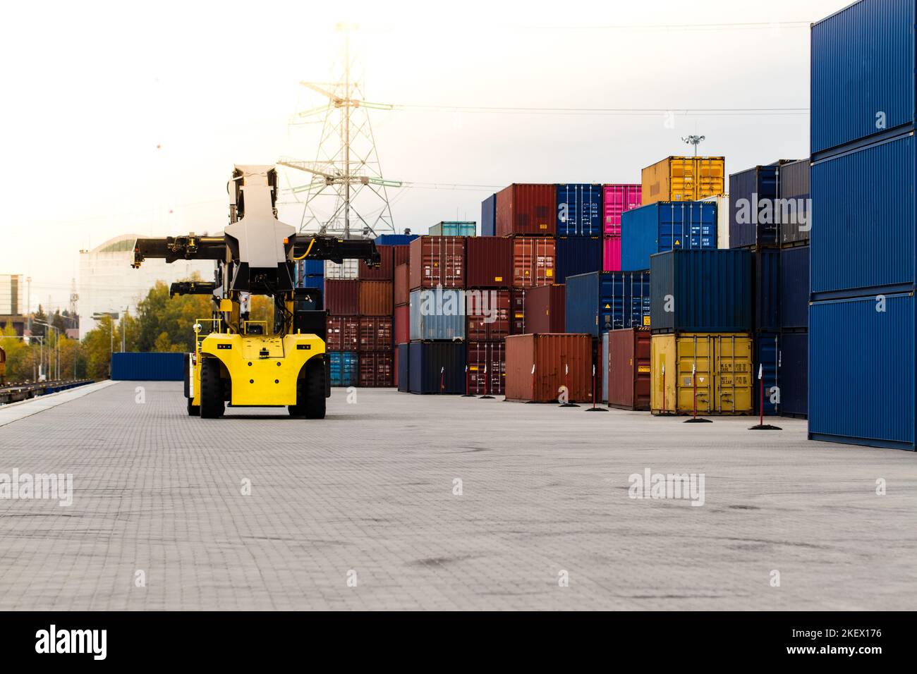 Forklift handling cargo container. Freight container loading. Container ... Forklift handling cargo container. Freight container loading. Container ...
