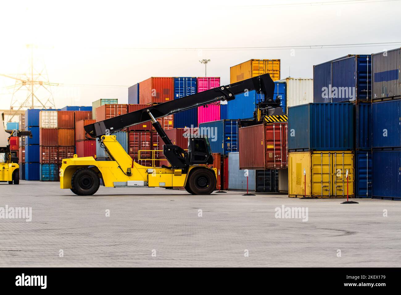 Forklift handling cargo container. Freight container loading. Container ...