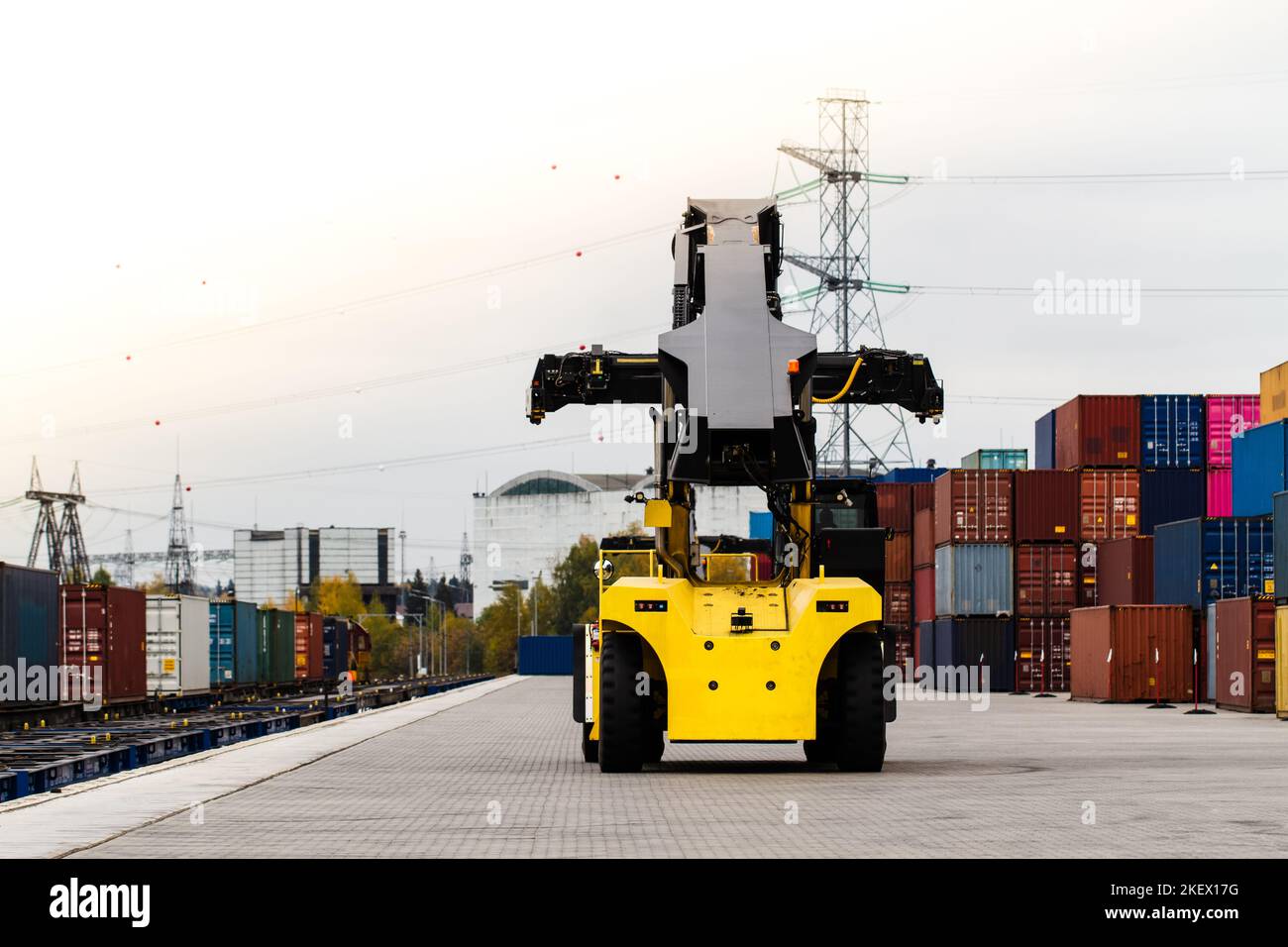 Forklift handling cargo container. Freight container loading. Container ...