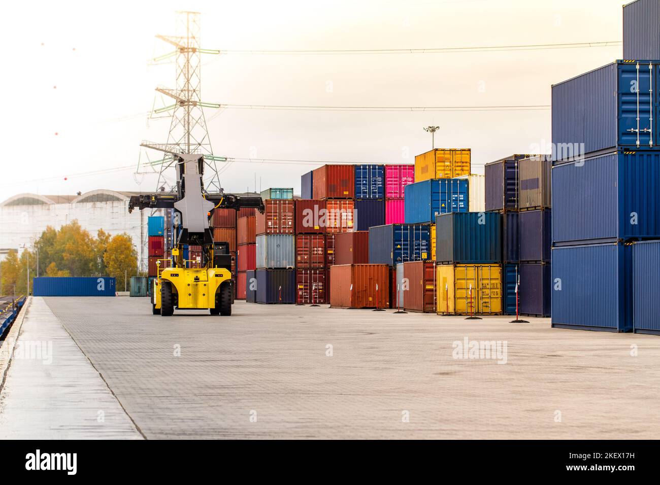 Forklift handling cargo container. Freight container loading. Container ...