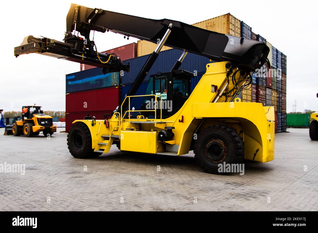 Container handlers. Forklift truck in shipping yard. Industrial ...