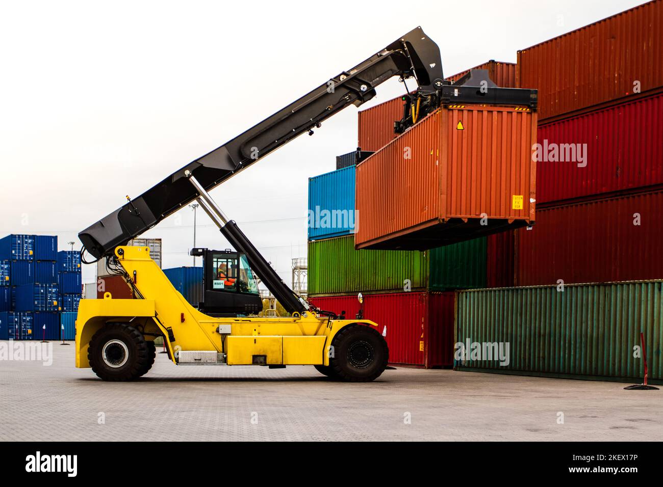 Container handlers. Forklift truck in shipping yard. Industrial ...