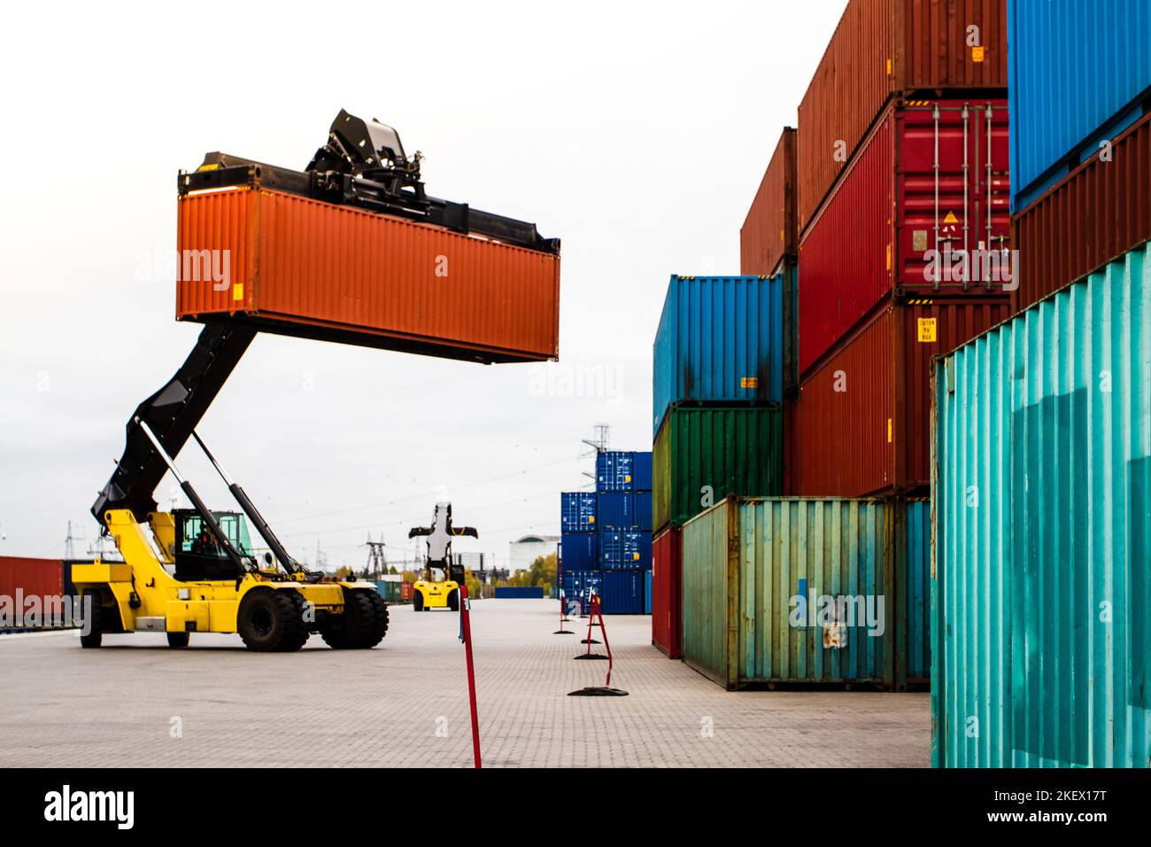 Forklift handling cargo container. Freight container loading. Container ...