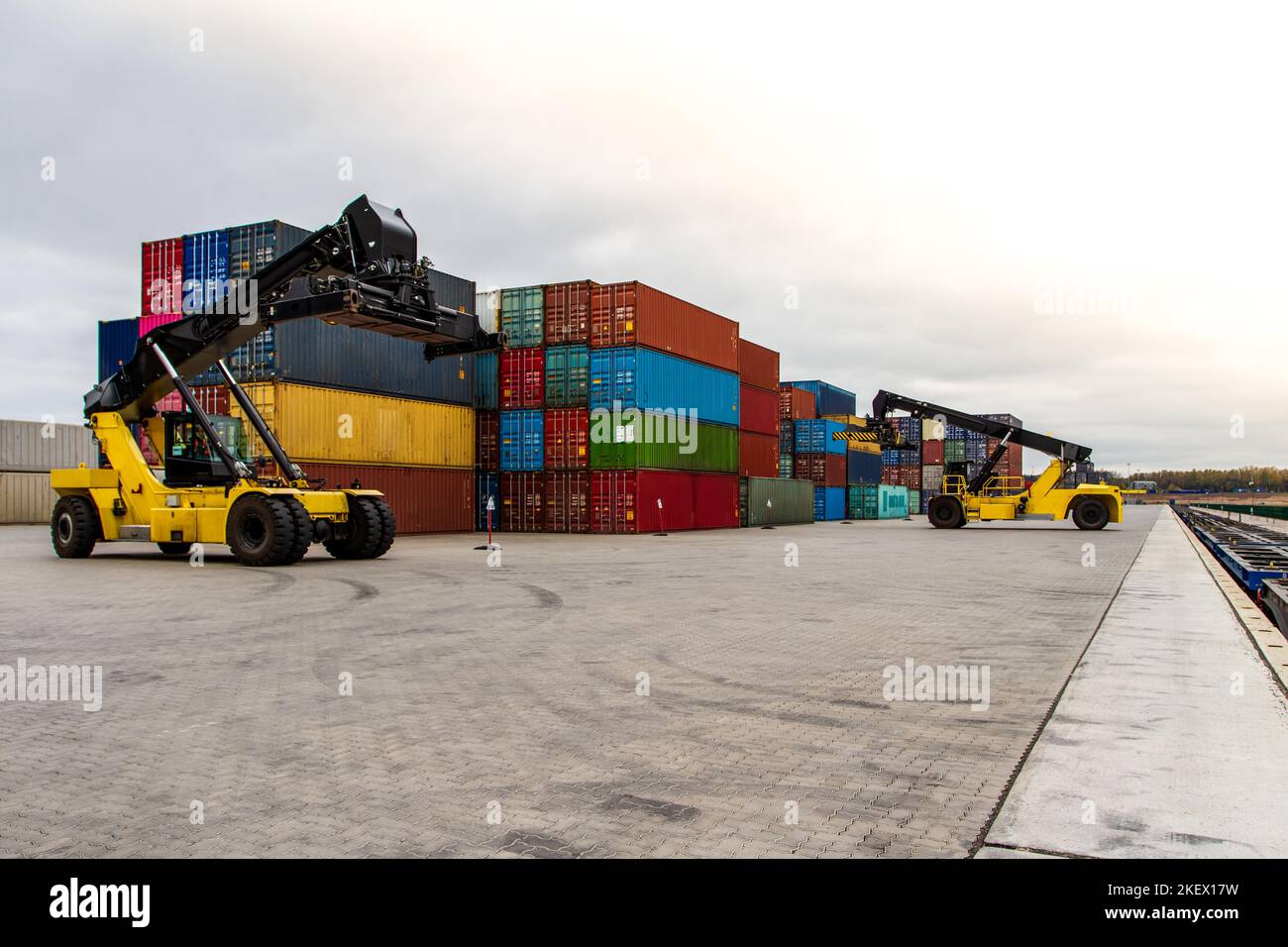 Forklift handling cargo container. Freight container loading. Container ...