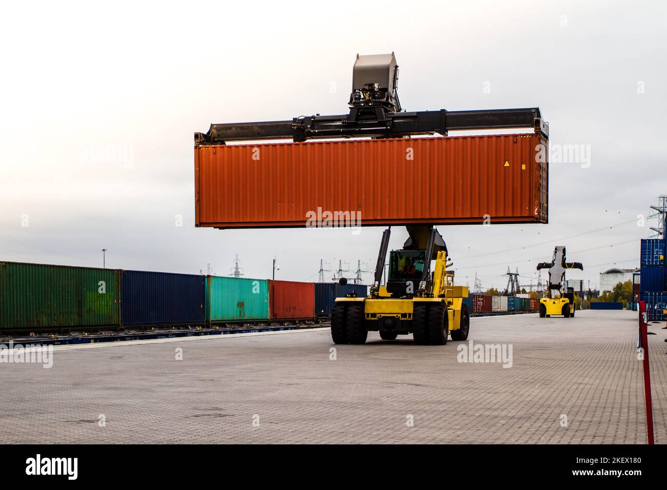Forklift handling cargo container. Freight container loading. Container ...