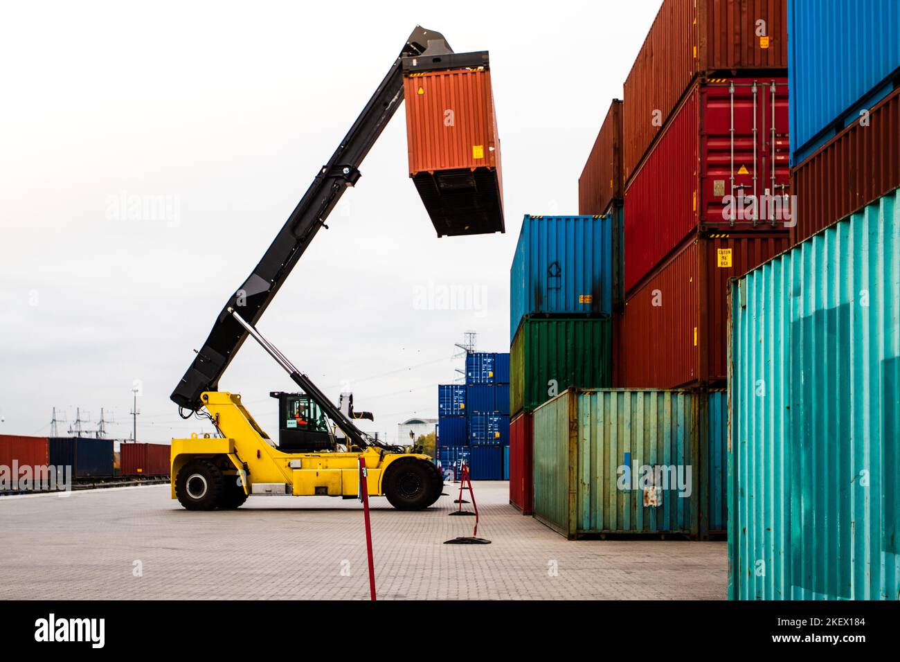 Forklift handling cargo container. Freight container loading. Container ...