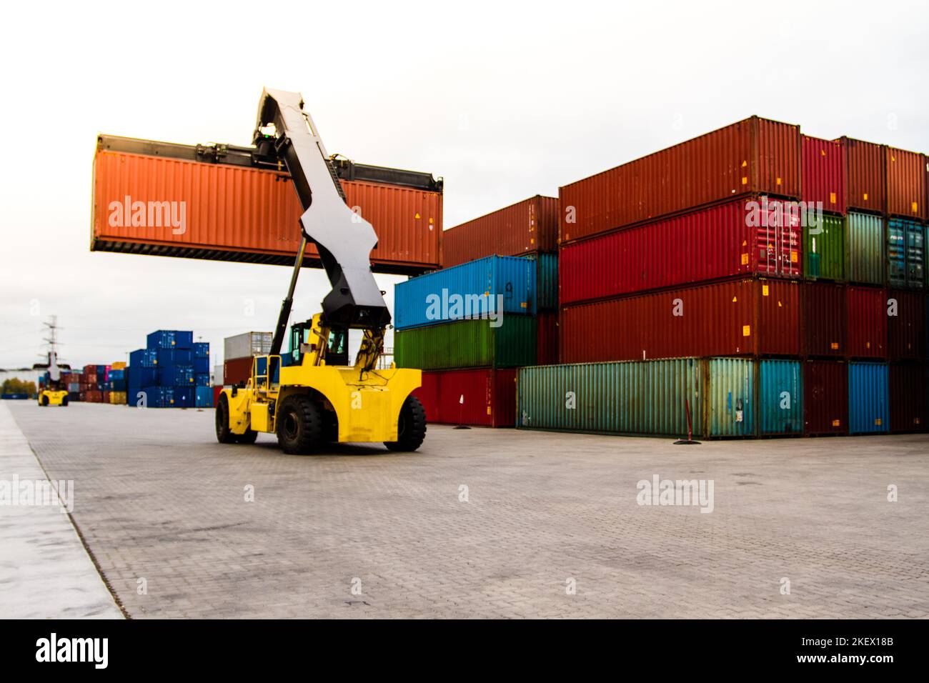 Container handlers. Forklift truck in shipping yard. Industrial ...
