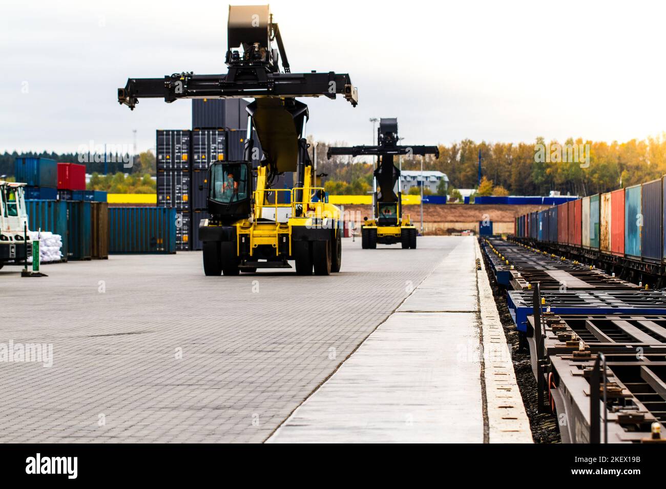 Forklift handling cargo container. Freight container loading. Container ...