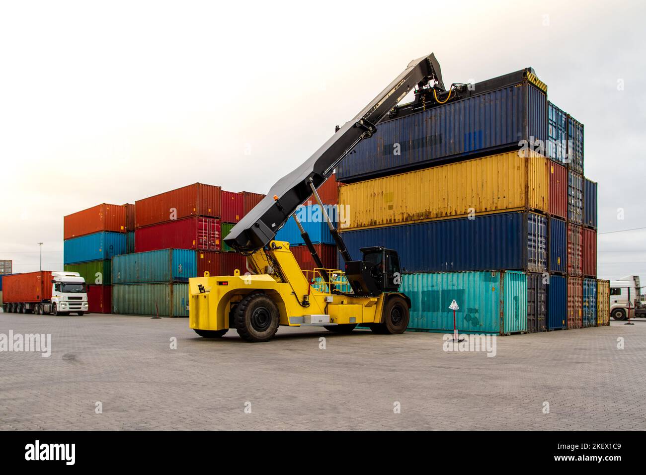 Forklift handling cargo container. Freight container loading. Container ...