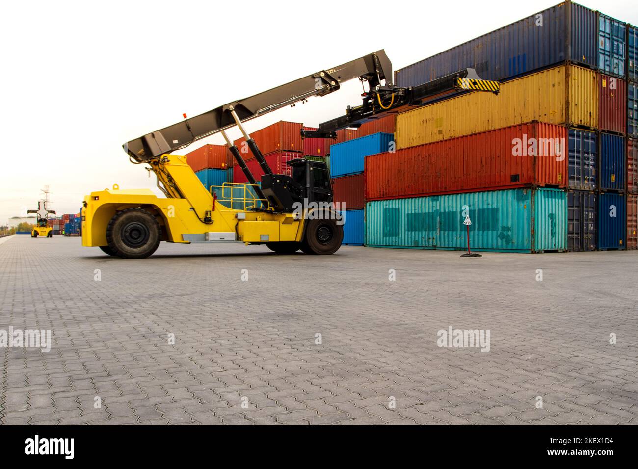 Forklift handling cargo container. Freight container loading. Container ...