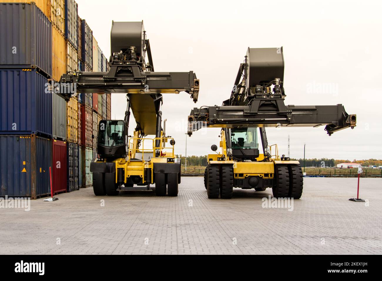 Forklift handling cargo container. Freight container loading. Container ...