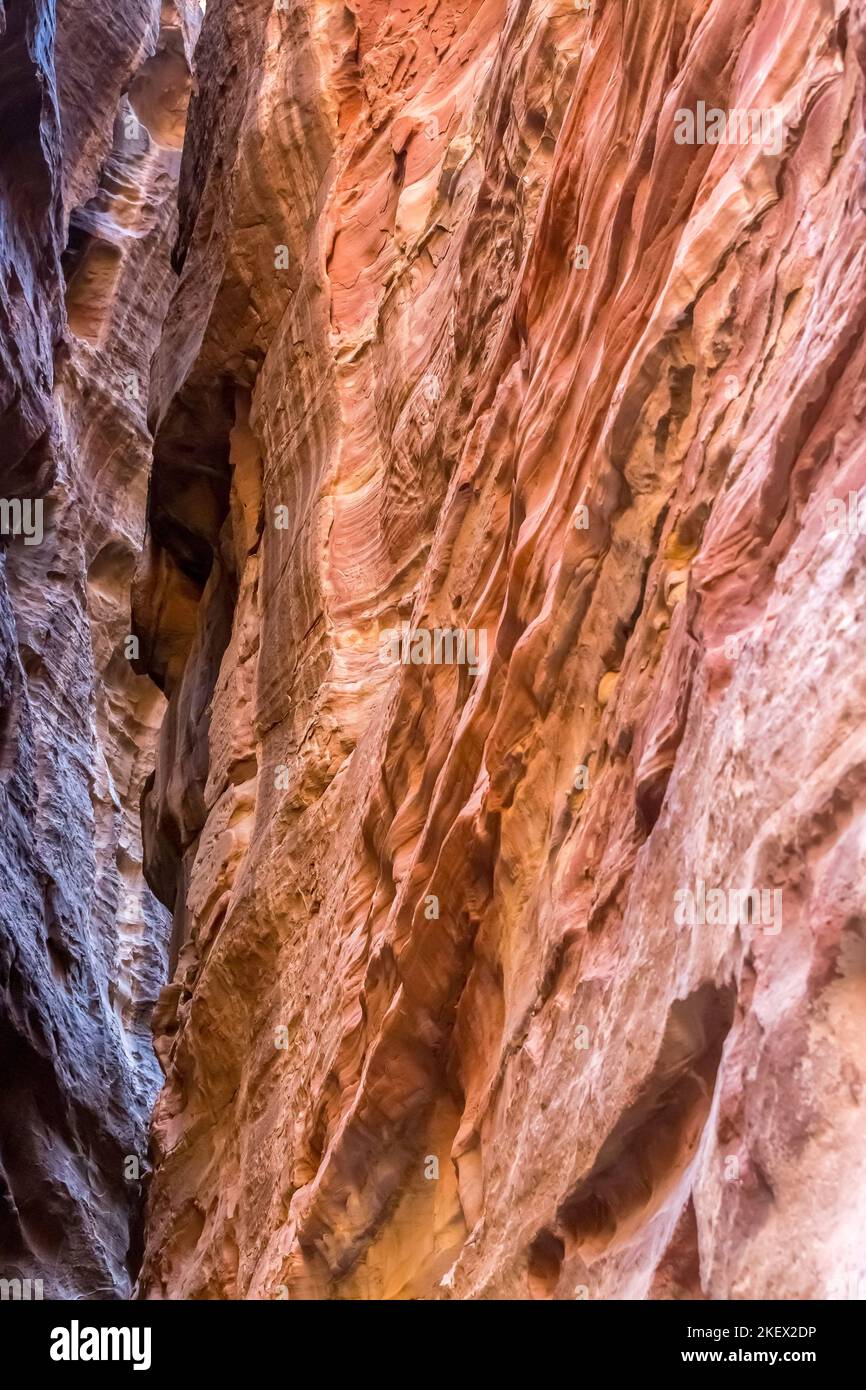 The Siq, narrow red canyon wall texture background in Petra, Jordan ...