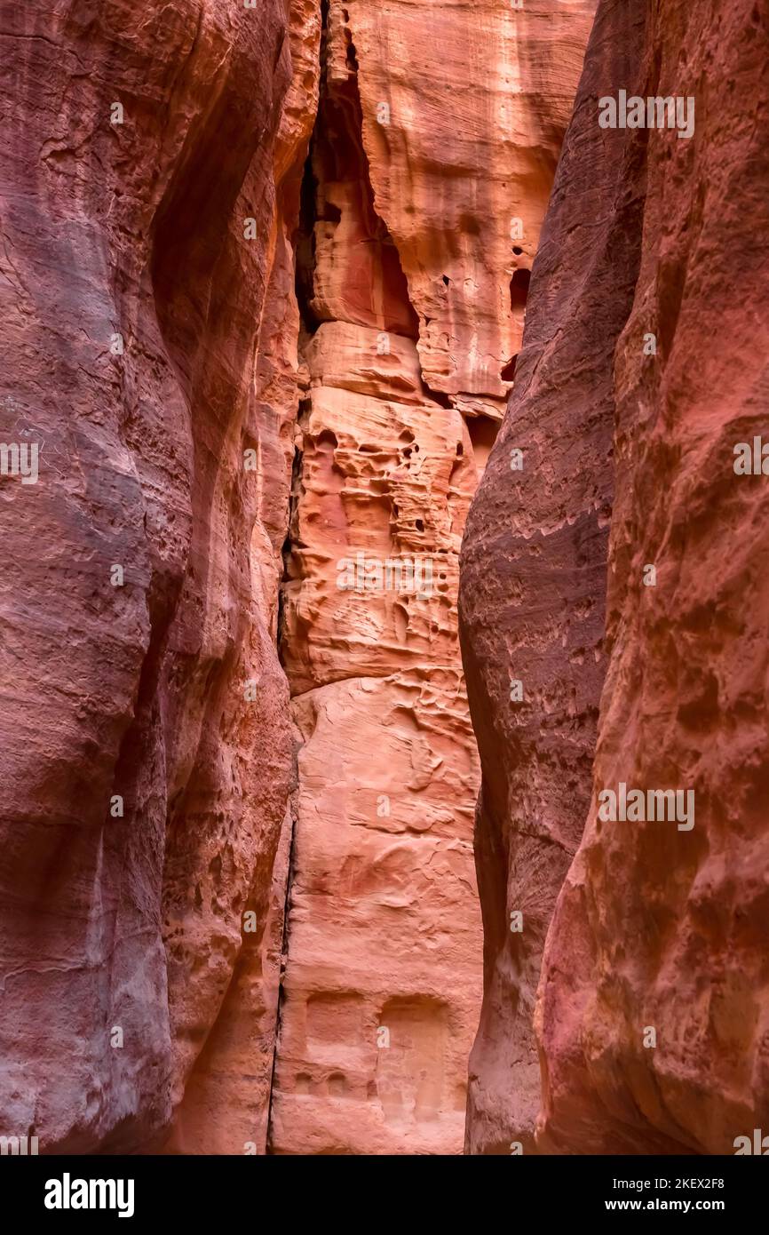The Siq, narrow red canyon wall texture background in Petra, Jordan, UNESCO World Heritage Site ...