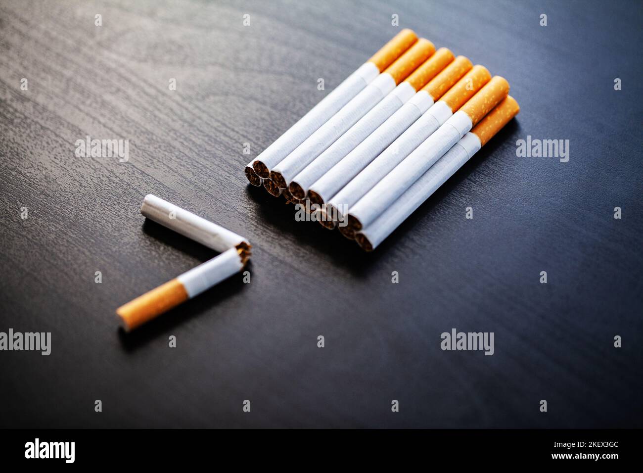 Stop smoking concept on background with broken cigarettes. Heap of ...