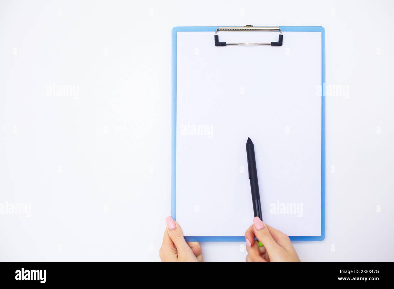 Blank Folder with White Paper. Hand that Holding Folder and Handle on ...
