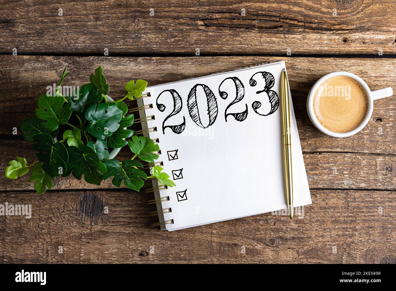 New year resolutions 2023 on desk. 2023 resolutions list with notebook ...