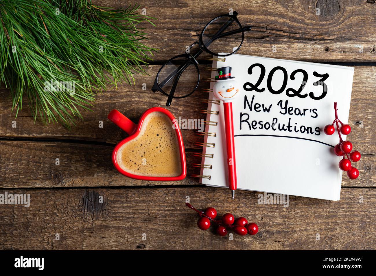 New year resolutions 2023 on desk. 2023 resolutions list with notebook ...