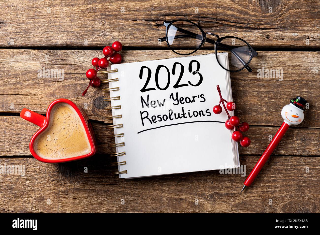New year resolutions 2023 on desk. 2023 resolutions list with notebook ...