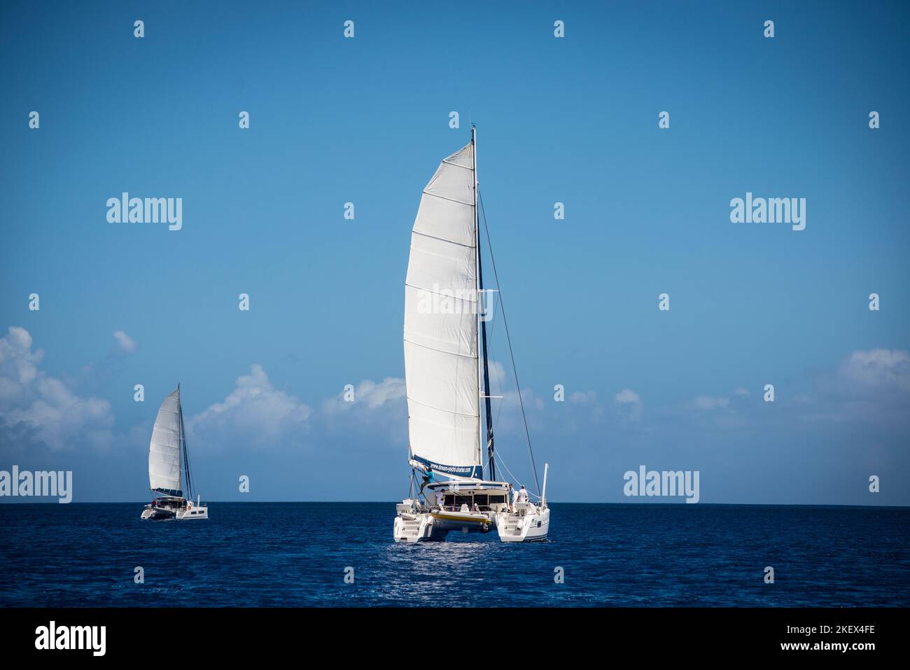 Catamarans under sail, French Polynesia Stock Photo - Alamy
