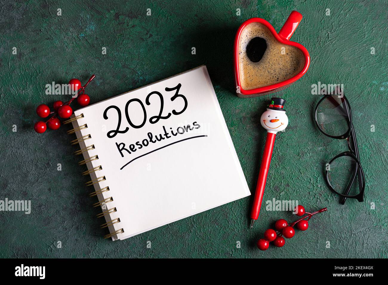 New year resolutions 2023 on desk. 2023 resolutions list with notebook ...