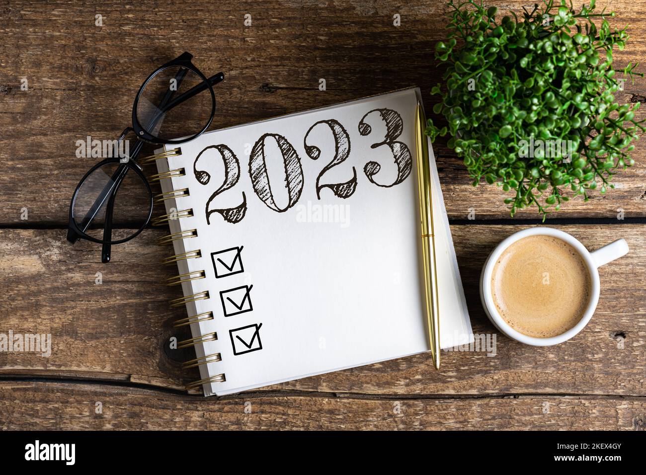 New year resolutions 2023 on desk. 2023 resolutions list with notebook ...